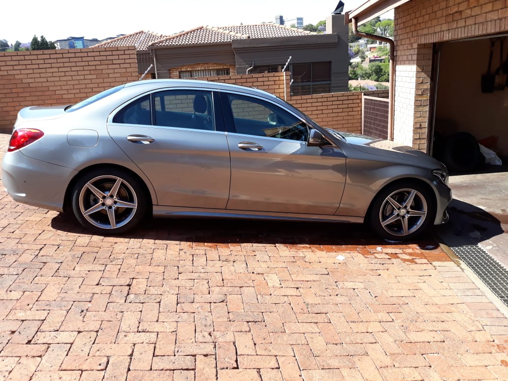 Fully serviced 2014 C200 with AMG line and rims. Sunroof, reverse ...