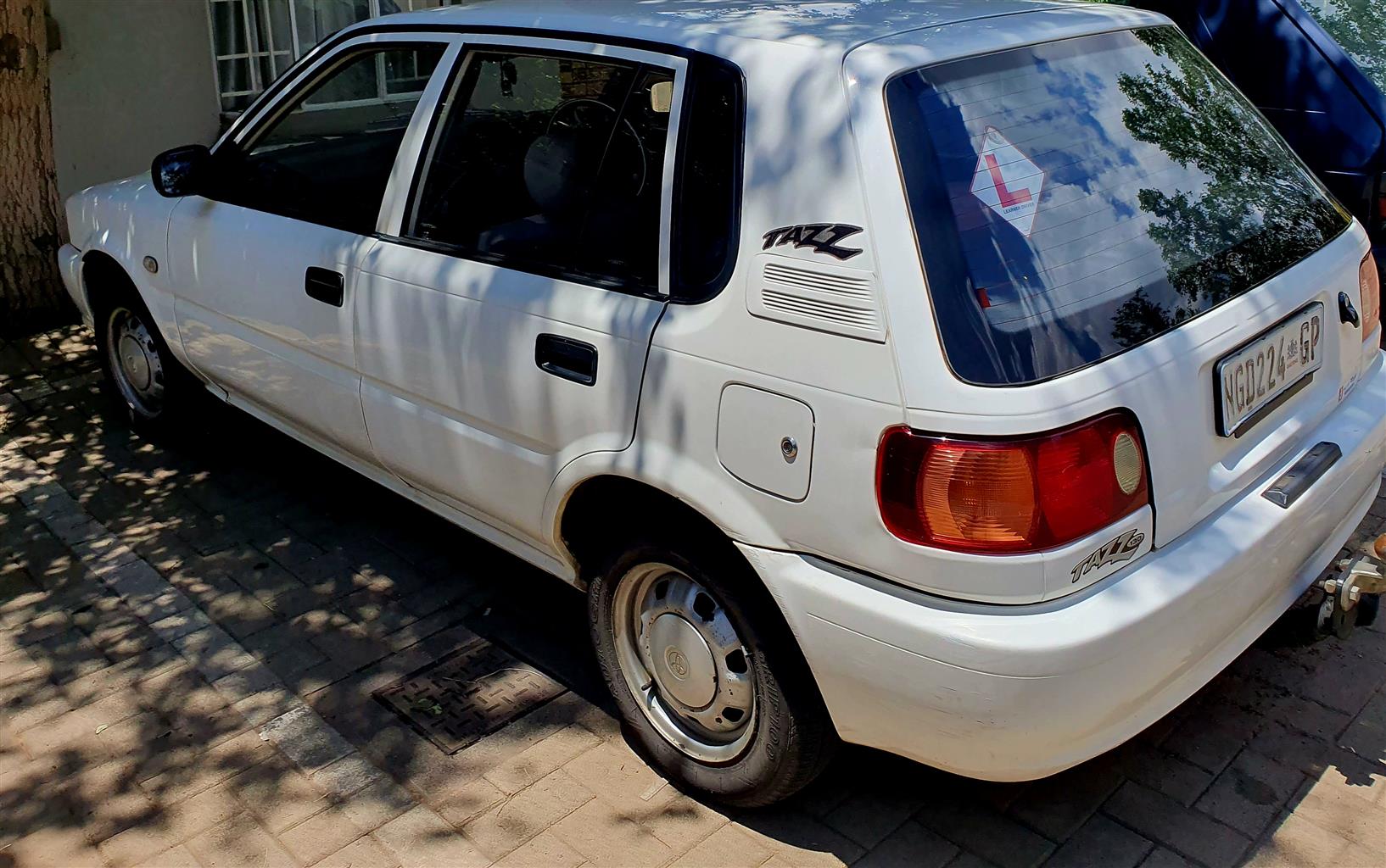 Toyota Tazz 1.3 very light on fuel. Radio, Front loader, Mobilizer, Tow ...