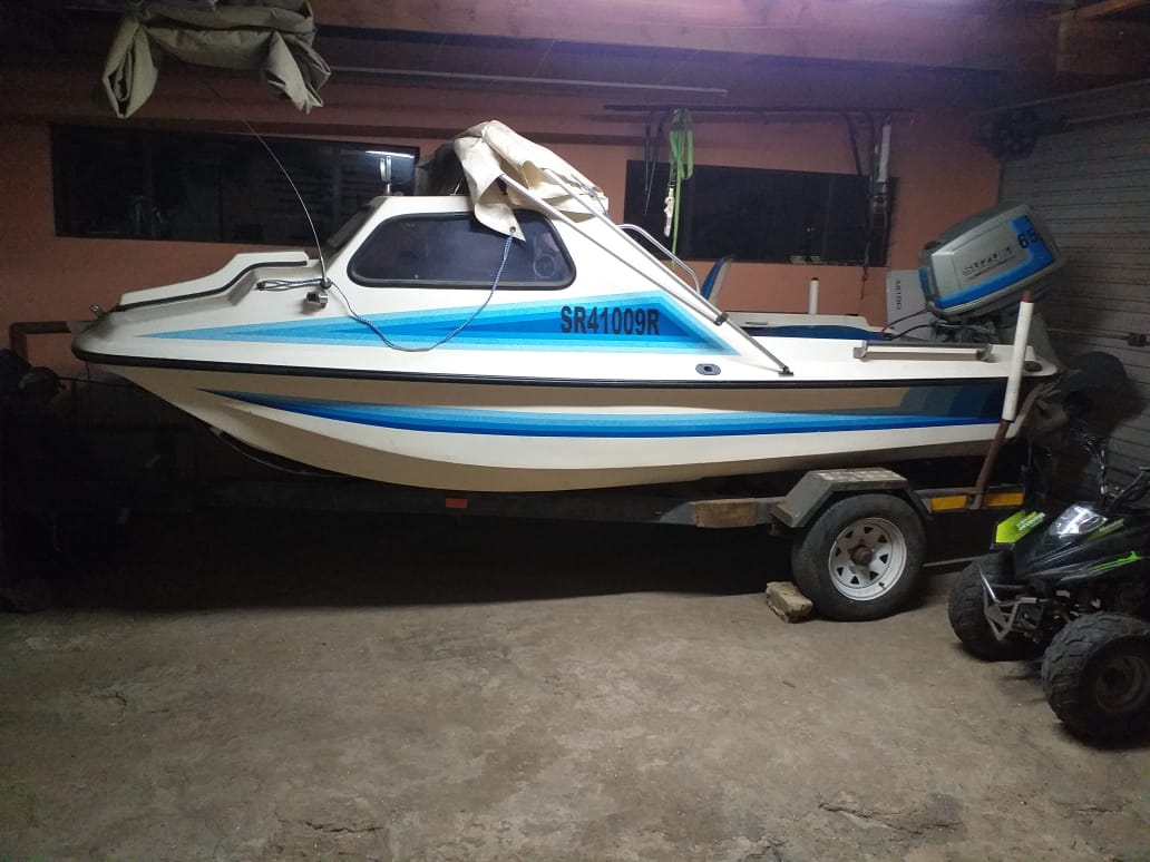 Cat Hull Cabin boat on trailer | Junk Mail Marketplace