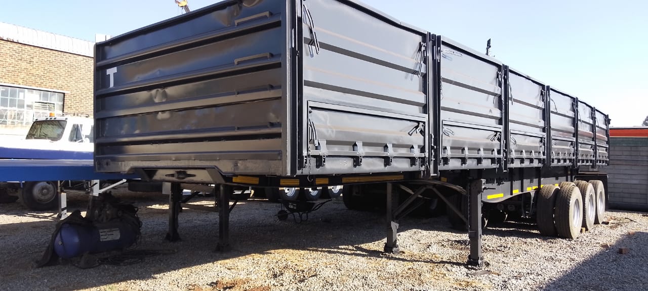 Drop side triaxle tipper trailer | Junk Mail
