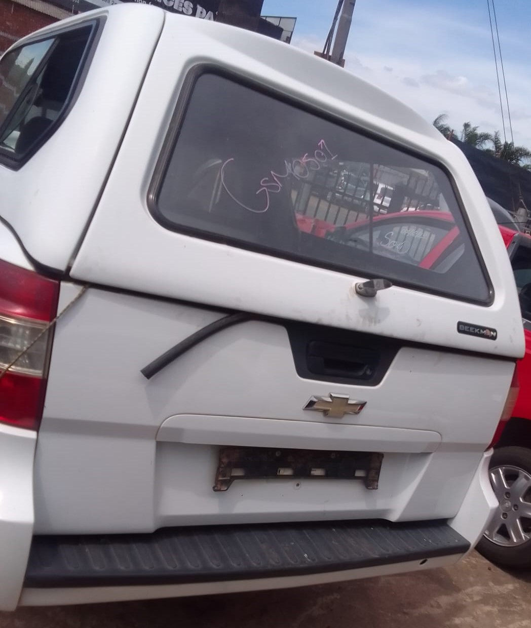 Stripping White Chev Utility 1.4 for Spare Parts | Junk Mail