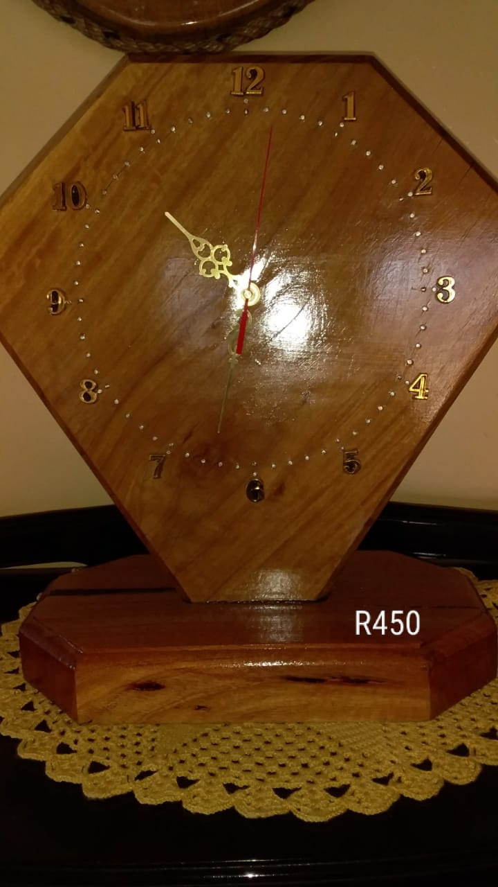 Handmade wooden clocks and canes | Junk Mail