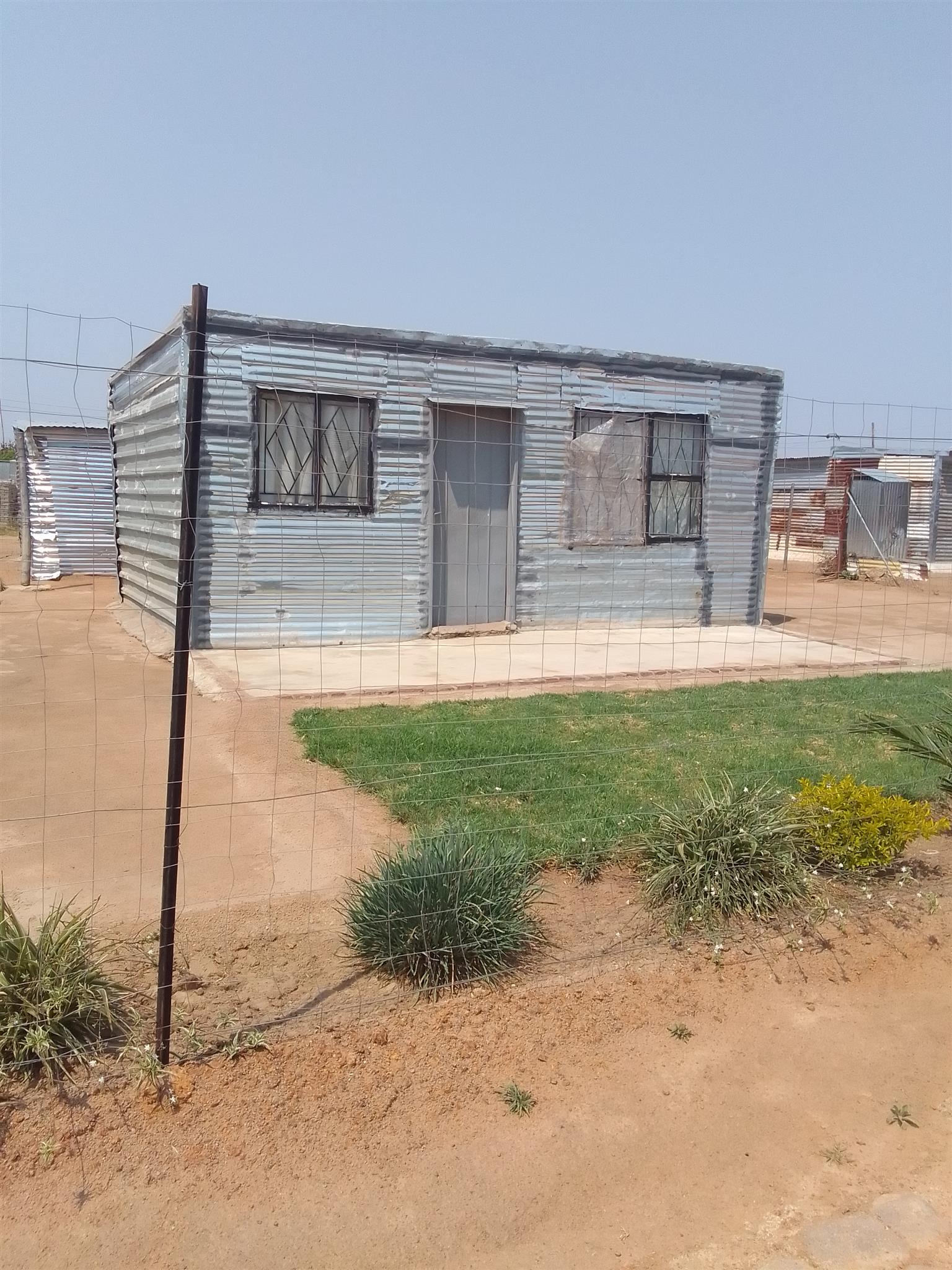 Stand with two rooms shack | Junk Mail