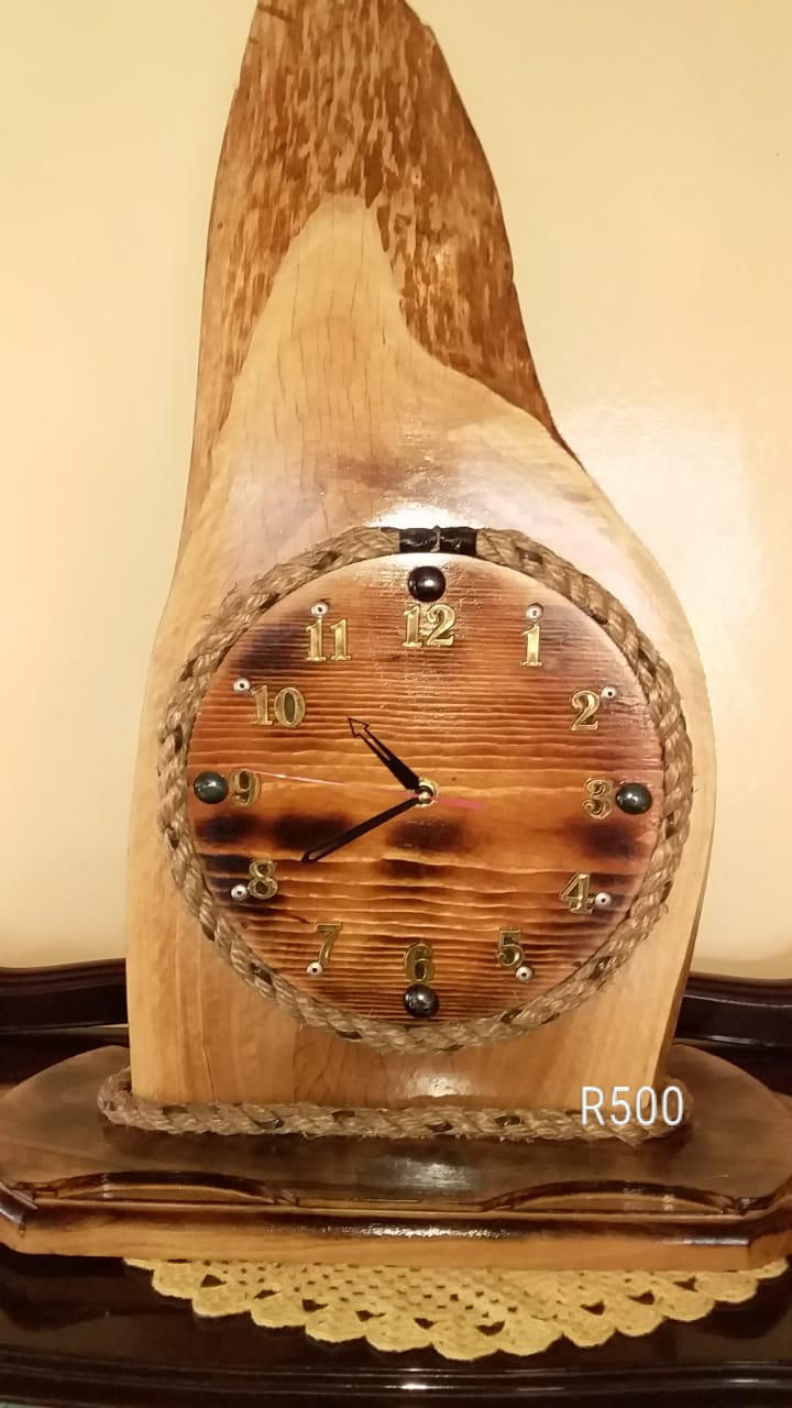 Handmade wooden clocks and canes | Junk Mail