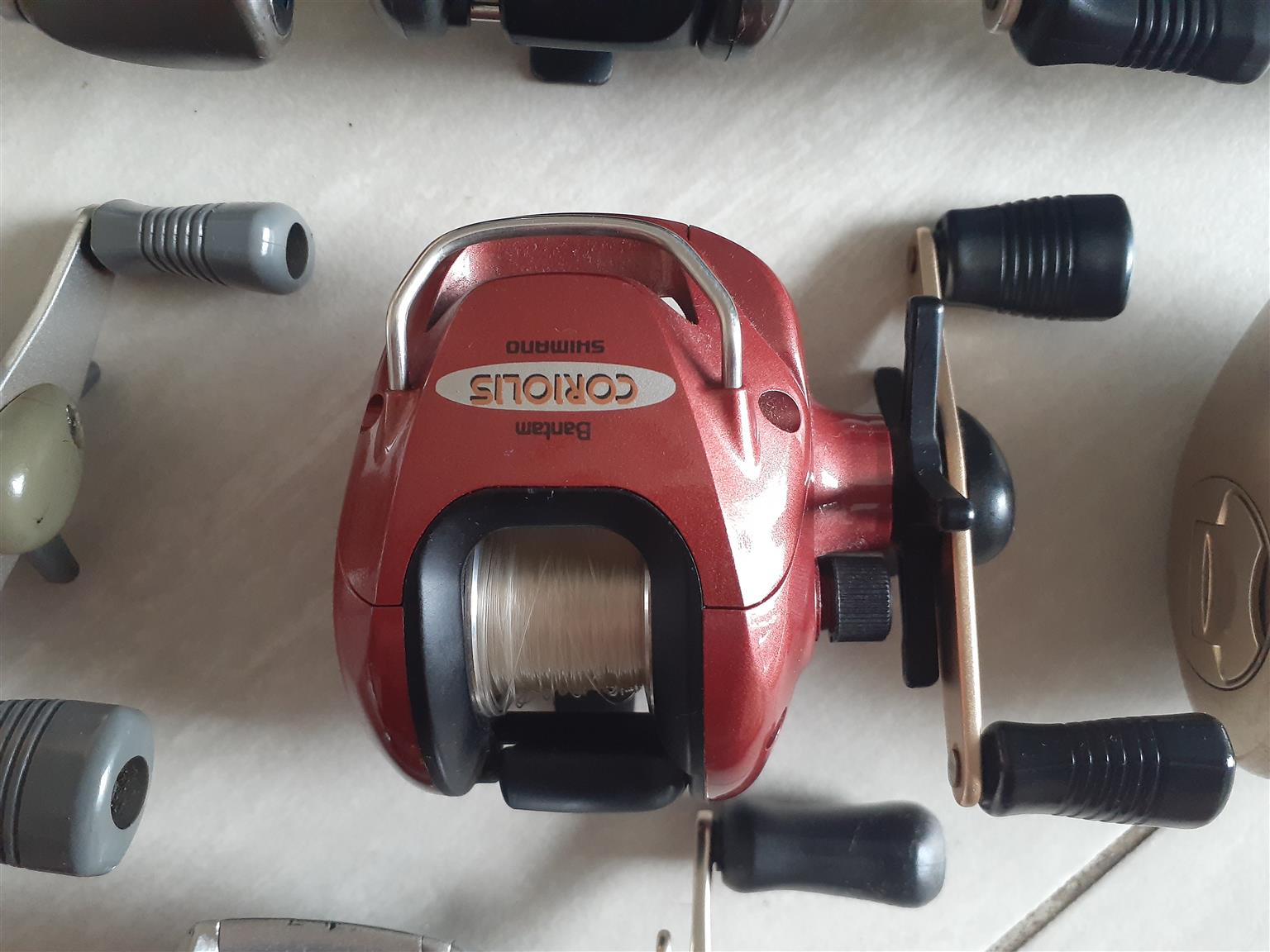 Various Bass fishing reels. Shimano: Chronarch, Curado, Coriolis ...