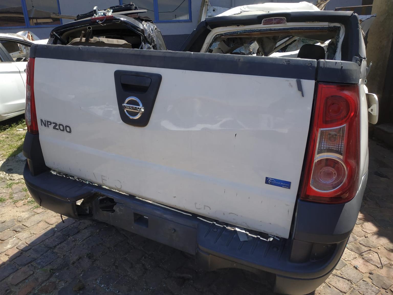 Nissan np200 np 200 complete tailgate / tail light | Junk Mail Marketplace