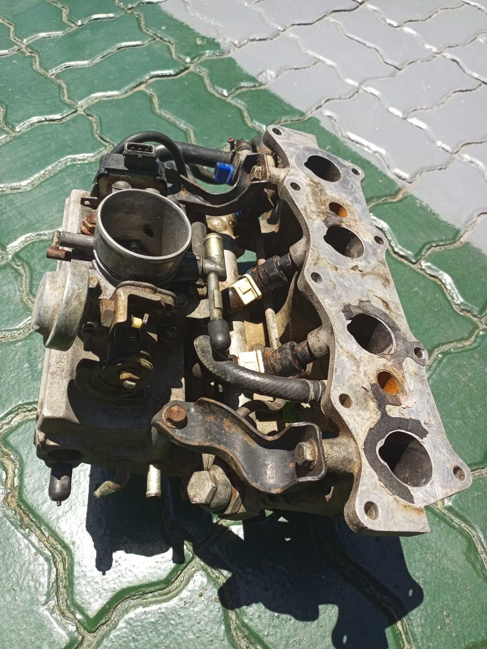 I'm selling the complete manifold for Mazda 323/Ford ruster | Junk Mail