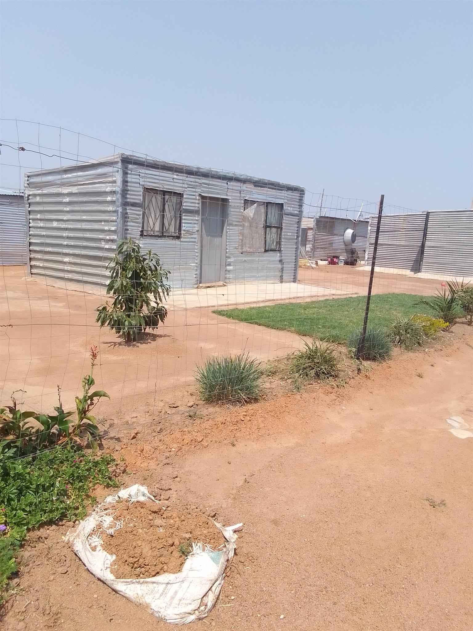 Stand with two rooms shack | Junk Mail