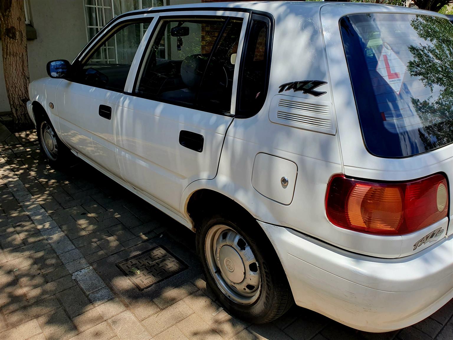 Toyota Tazz 1.3 very light on fuel. Radio, Front loader, Mobilizer, Tow ...
