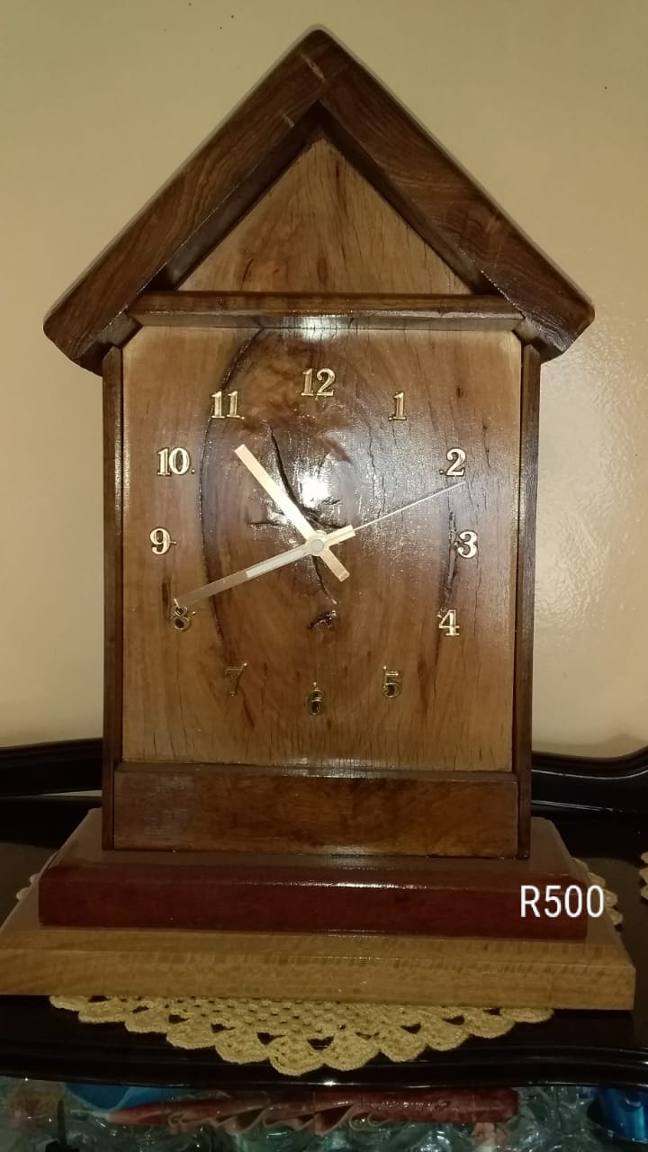 Handmade wooden clocks and canes | Junk Mail Marketplace