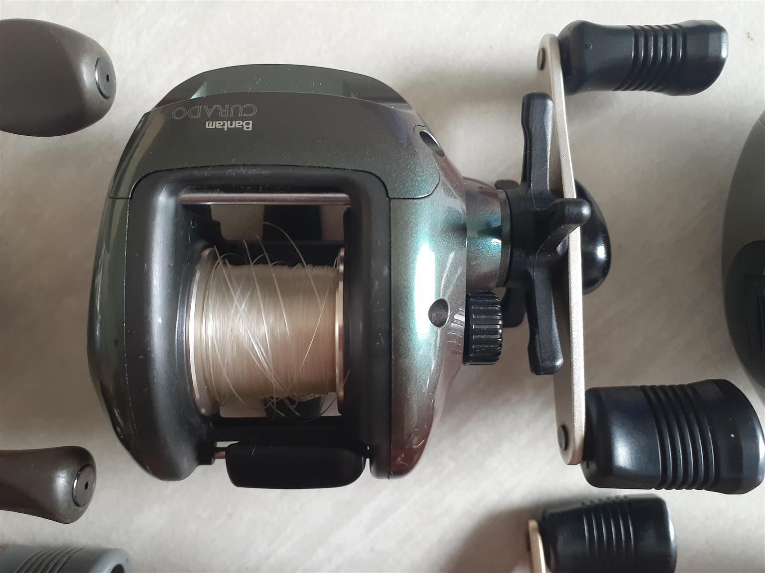 Various Bass fishing reels. Shimano: Chronarch, Curado, Coriolis ...