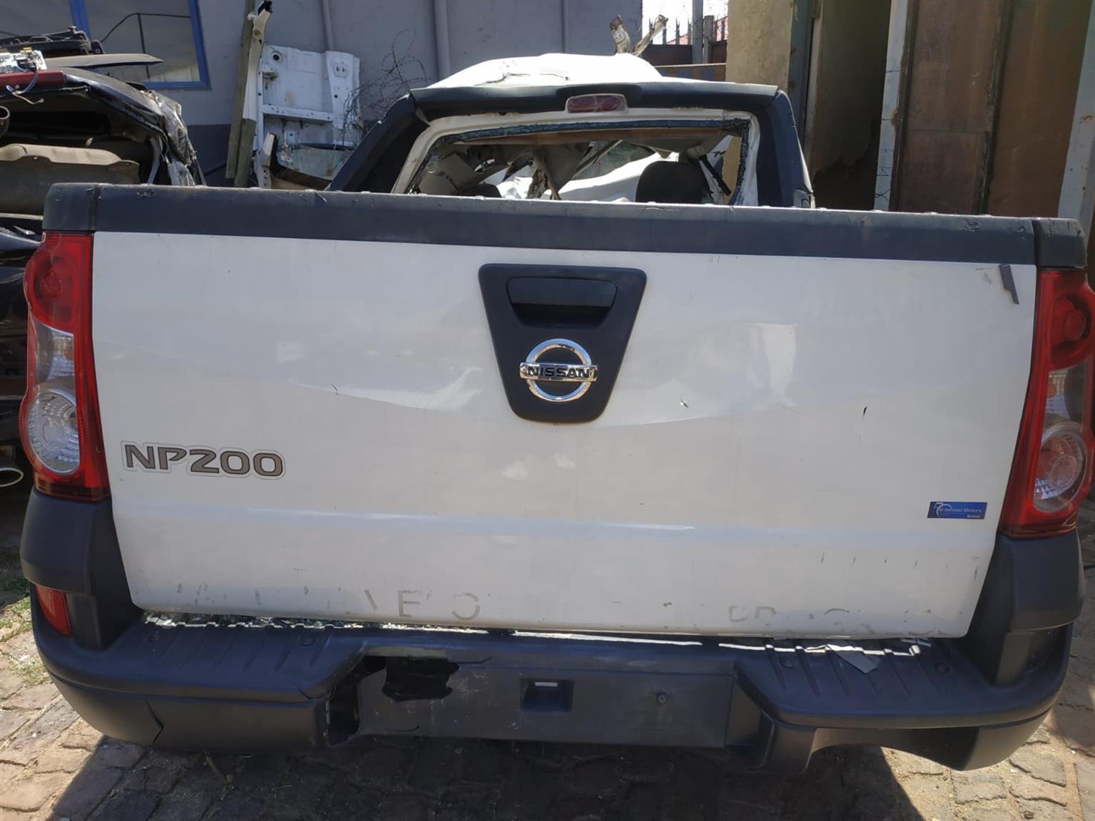 Nissan np200 np 200 complete tailgate / tail light | Junk Mail Marketplace