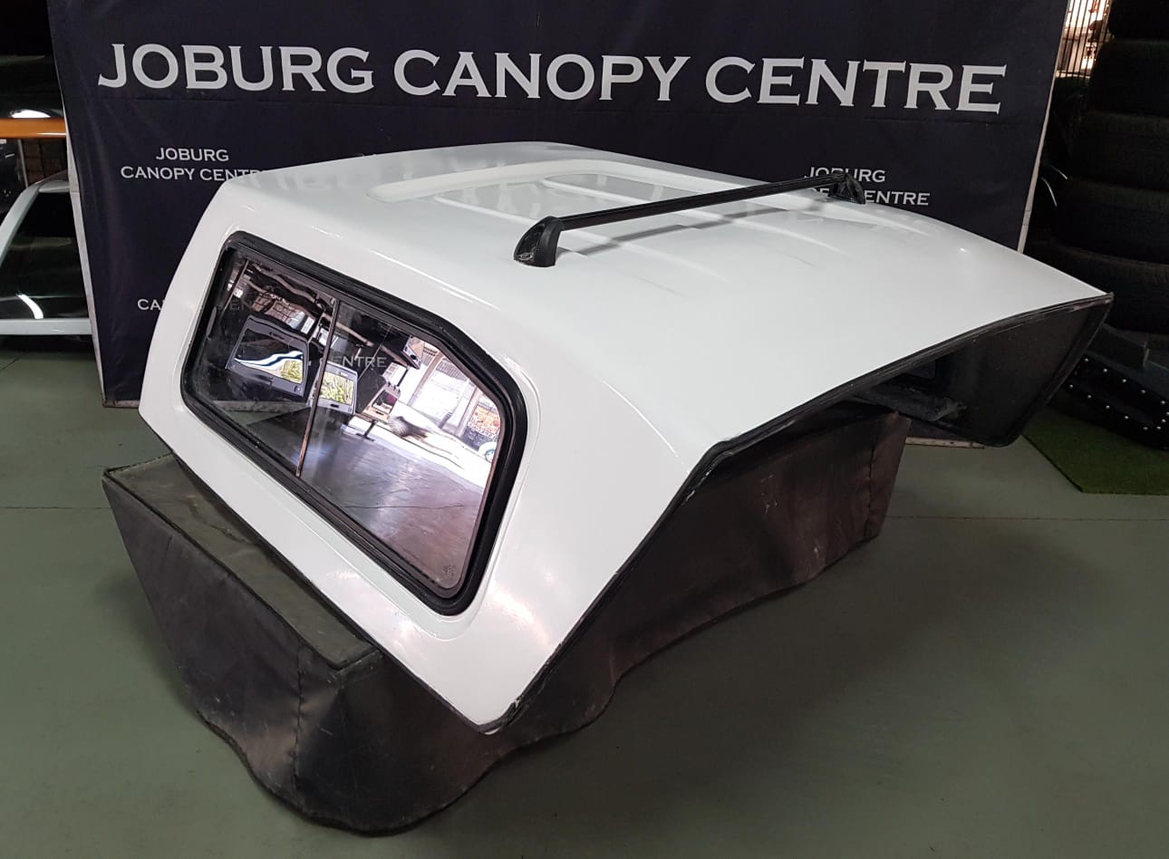 [3409] NISSAN NP200 LOWLINE WHITE ANDYCAB CANOPY | Junk Mail Marketplace