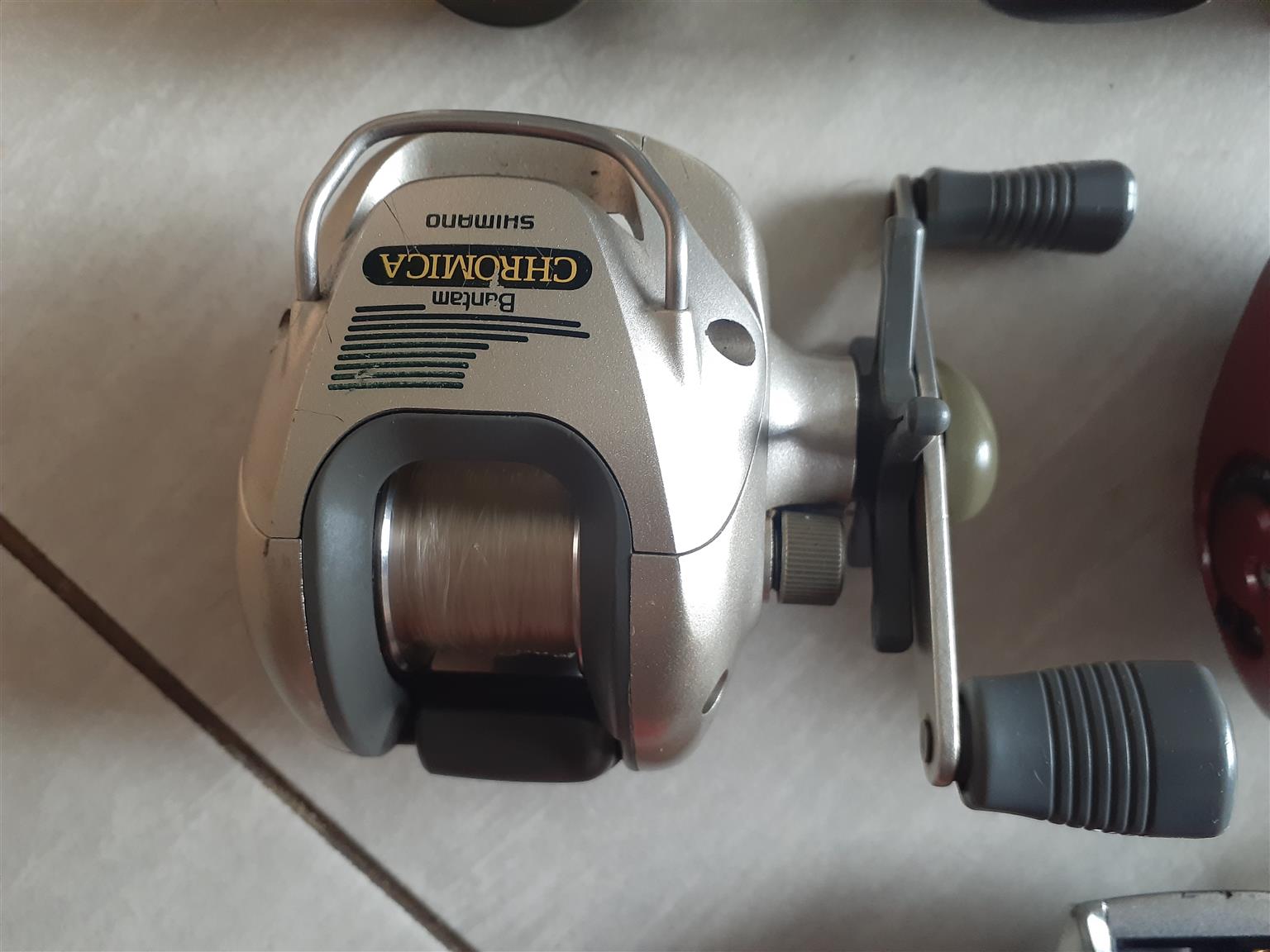 Various Bass fishing reels. Shimano: Chronarch, Curado, Coriolis ...