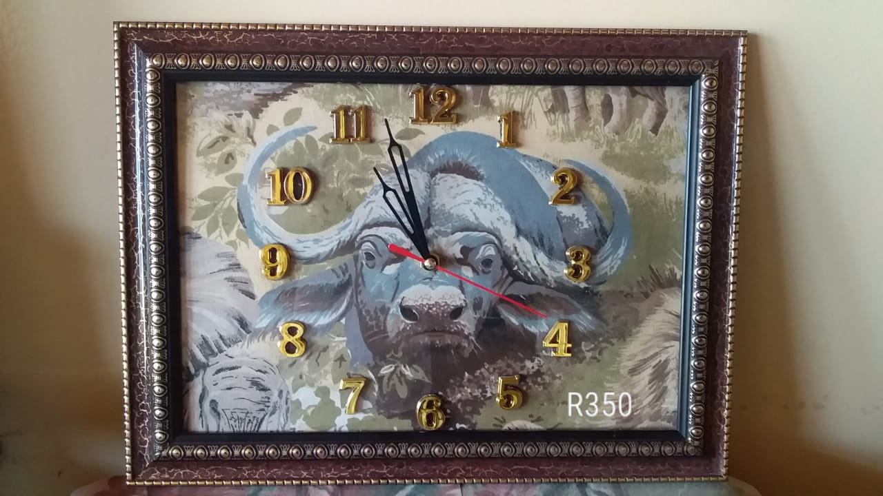 Handmade wooden clocks and canes | Junk Mail Marketplace