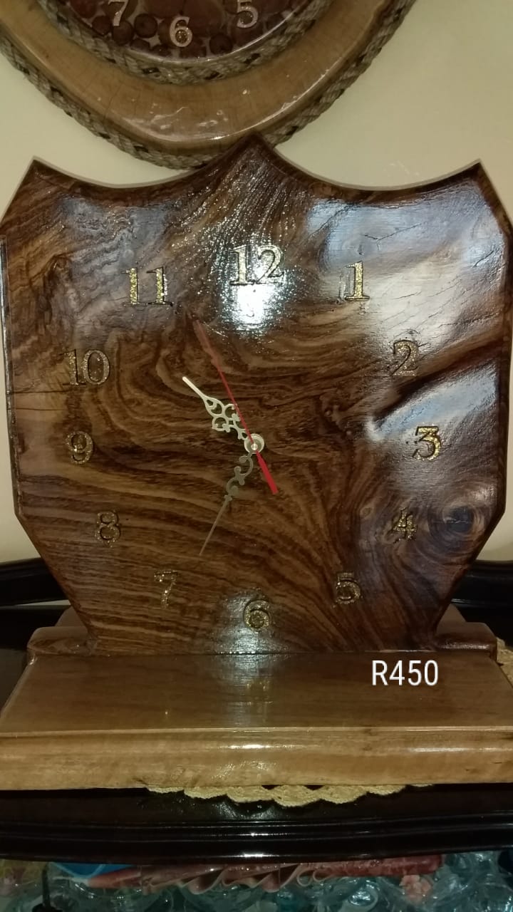 Handmade wooden clocks and canes | Junk Mail Marketplace