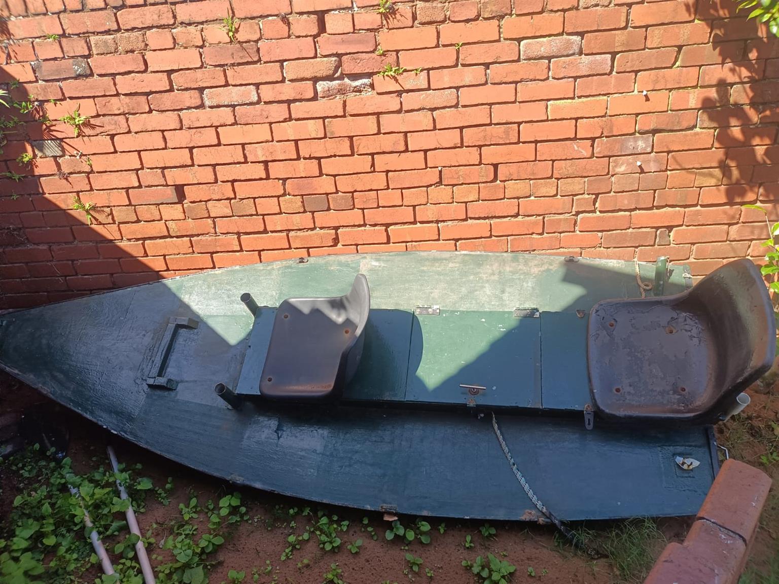 Small 4 stroke outboard motor and flat bottomed ski vee | Junk Mail