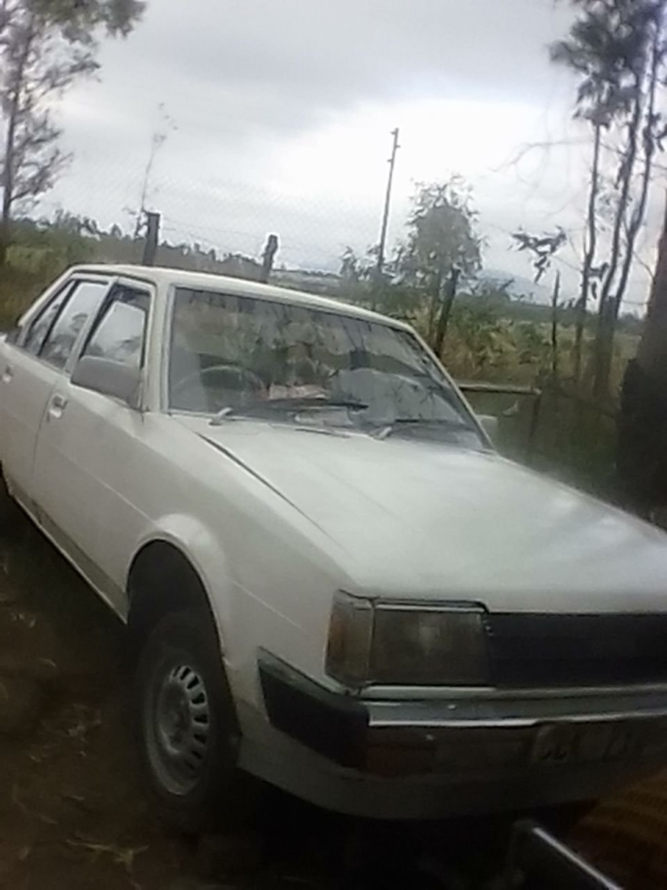 Toyota Corolla 1982 body stripping for spares. 4 doors, bonnet, boot ...