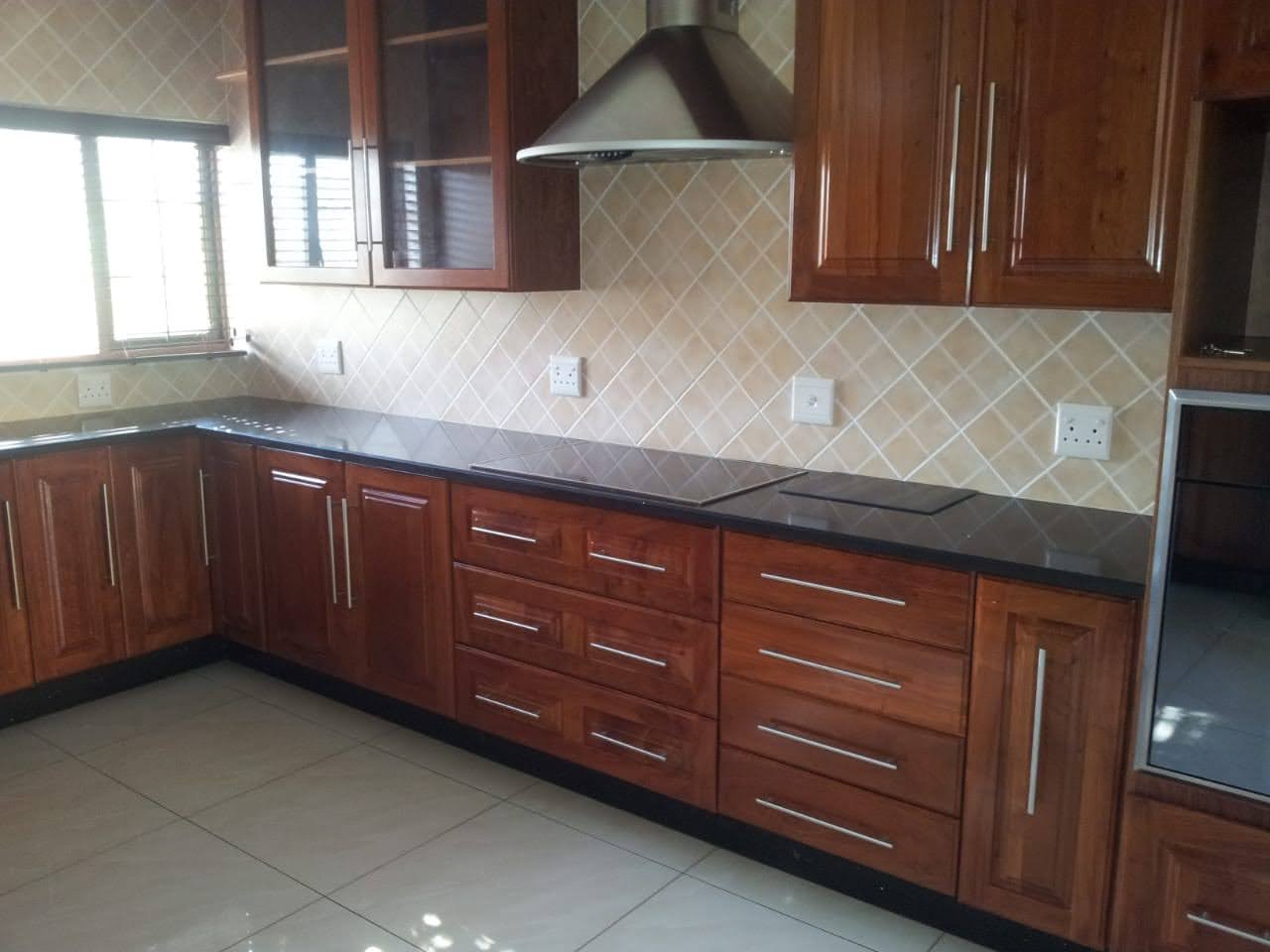 Carpentry of custom built in cupboards & Wardrobes, Tiling & Laminated ...
