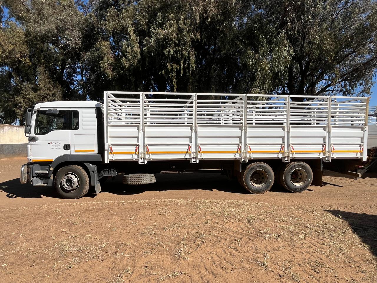 MAN 25-280 2016 AND DRAWBAR DROPSIDE CATTLE TRAILER COMBO | Junk Mail ...