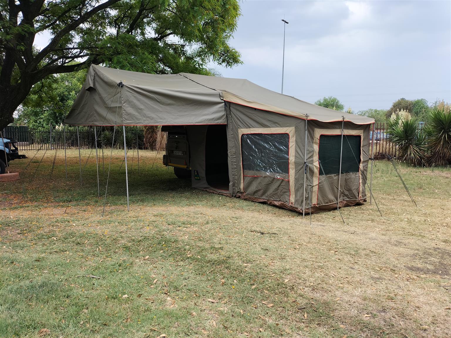Howling moon trailer tent with add a room, awning and side panels ...
