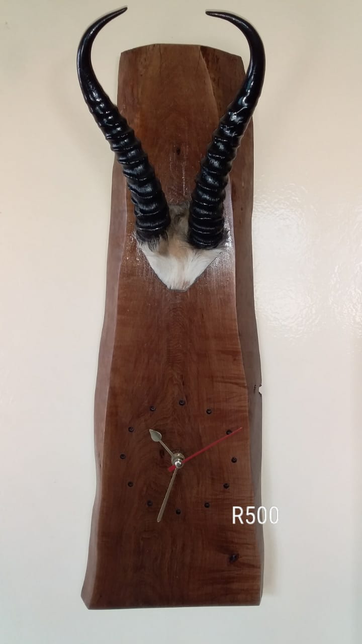 Handmade wooden clocks and canes | Junk Mail Marketplace