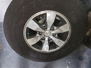 4xR16 Bridgestone dueler tyres with Prado mags | Junk Mail Marketplace